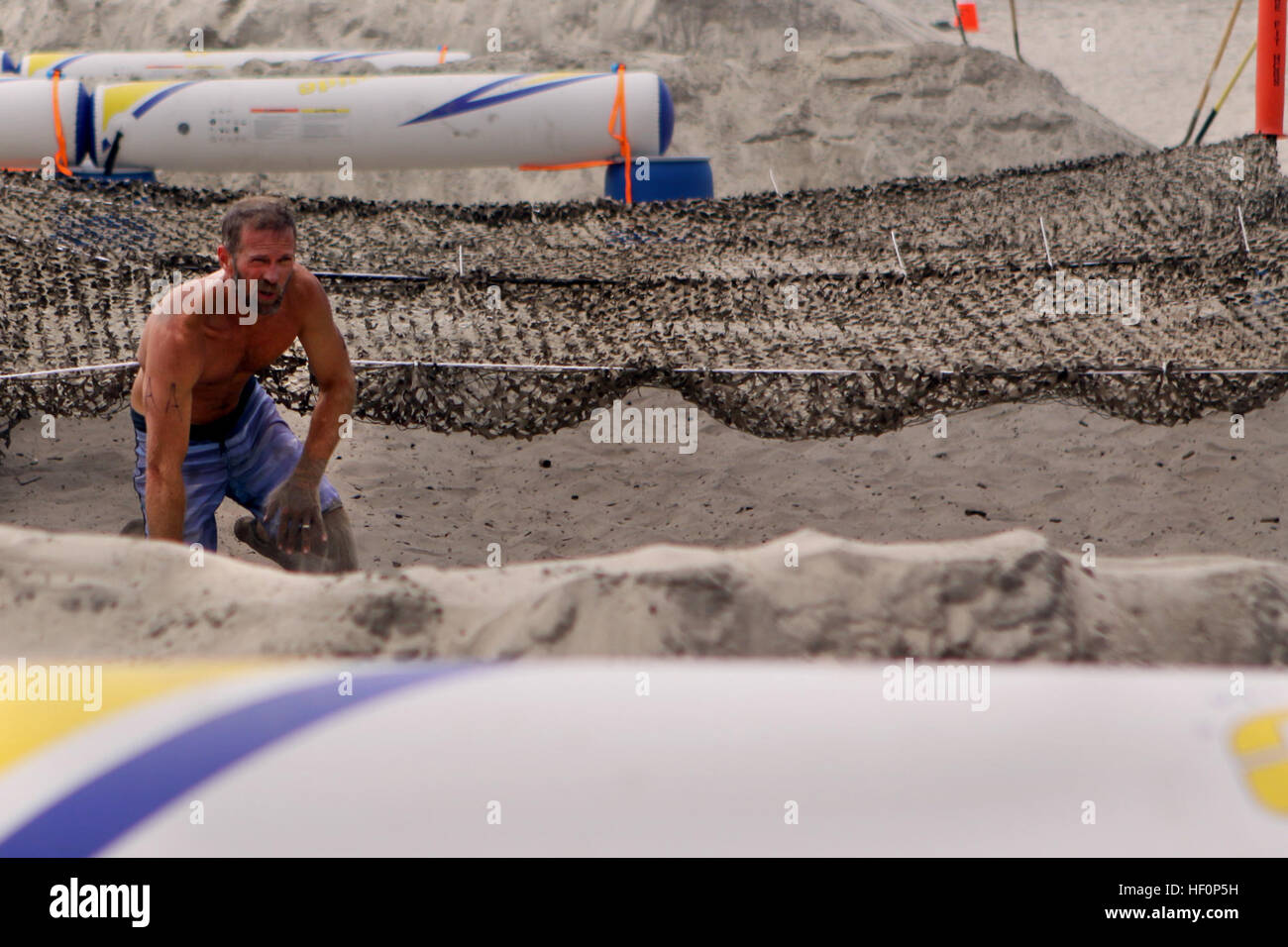 Jeremiah, Murphy, 41, charges through the obstacle course part of the ...