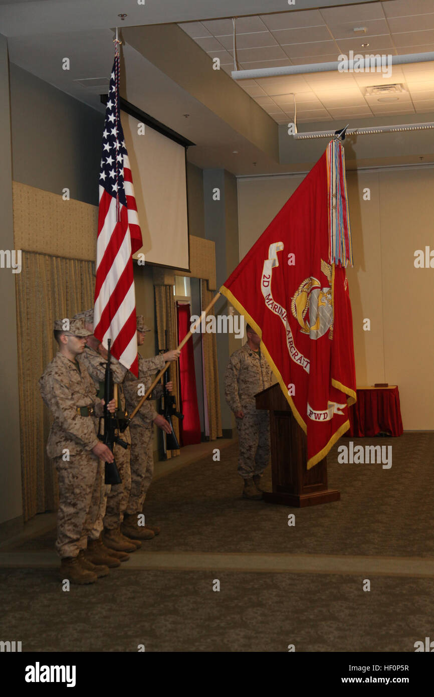 The colors of the 2nd Marine Aircraft Wing (Forward) are lowered during ...
