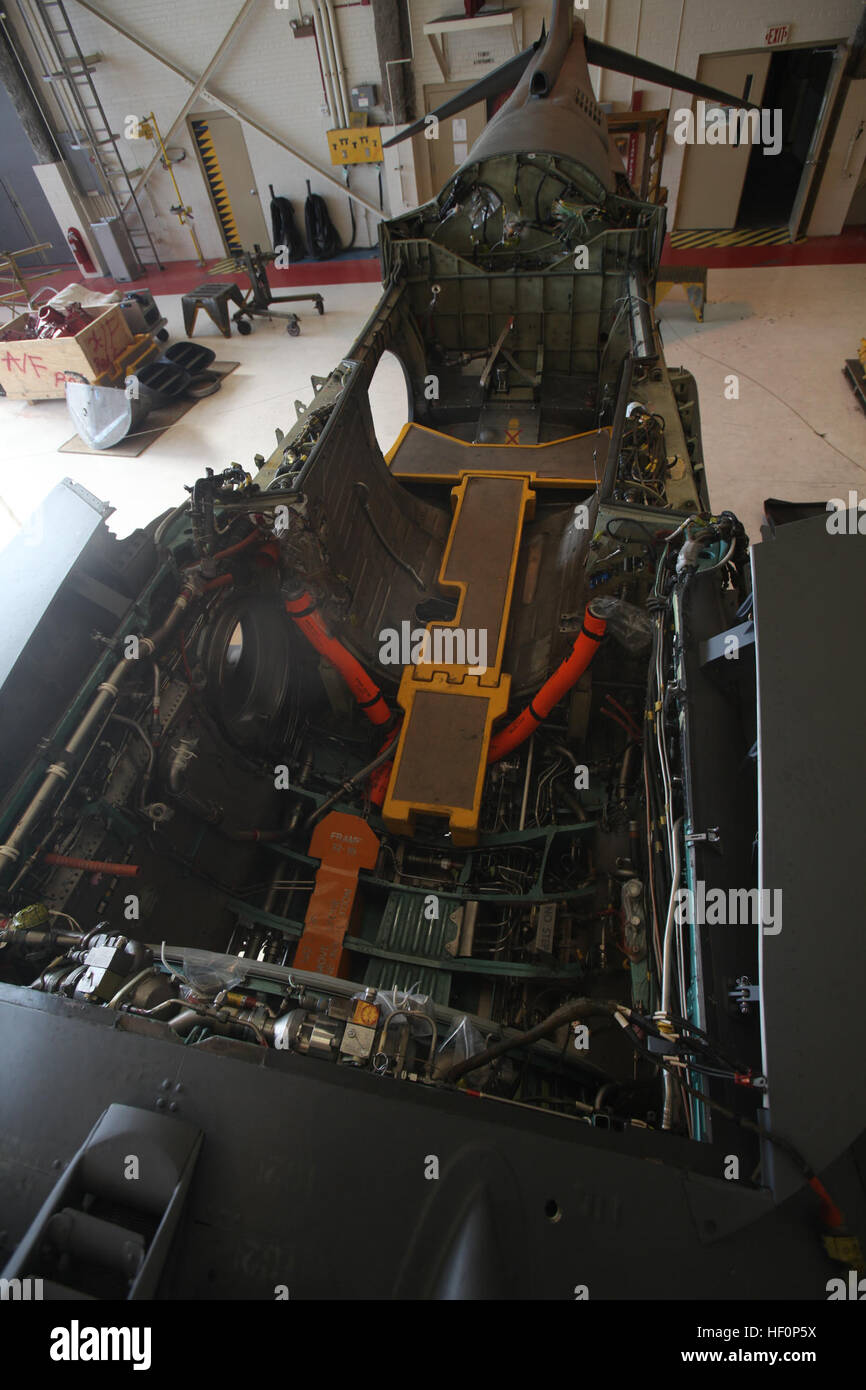 The inside of an AV-8B Harrier with the Pegasus engine removed. The ...