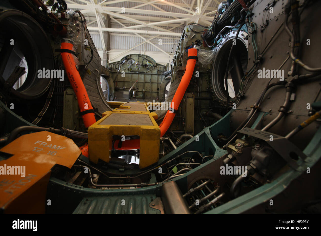 The inside of an AV-8B Harrier with the Pegasus engine removed. The ...