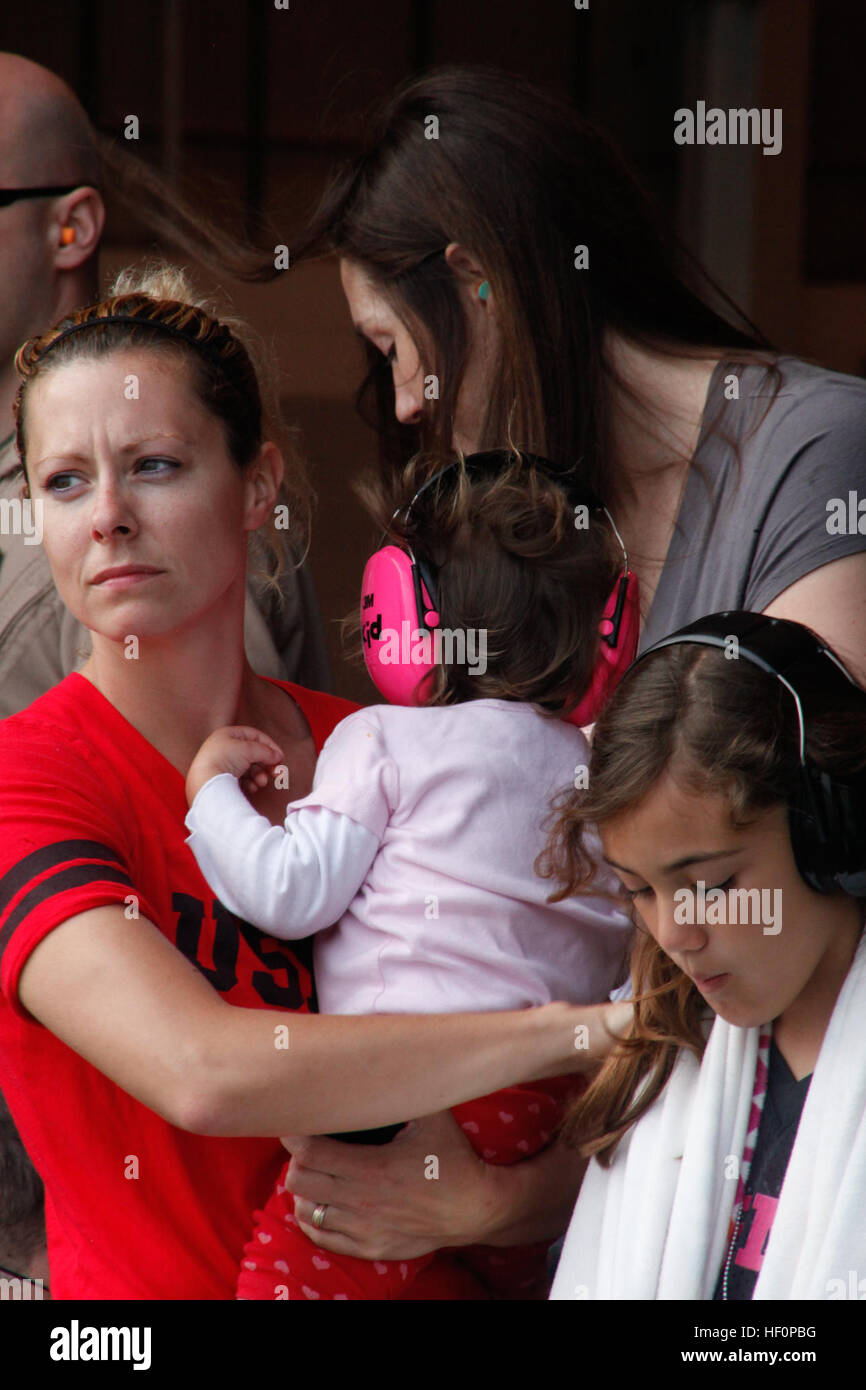 Jen Mitchell embraces her children, 16-month-old Leia and 9-year old ...