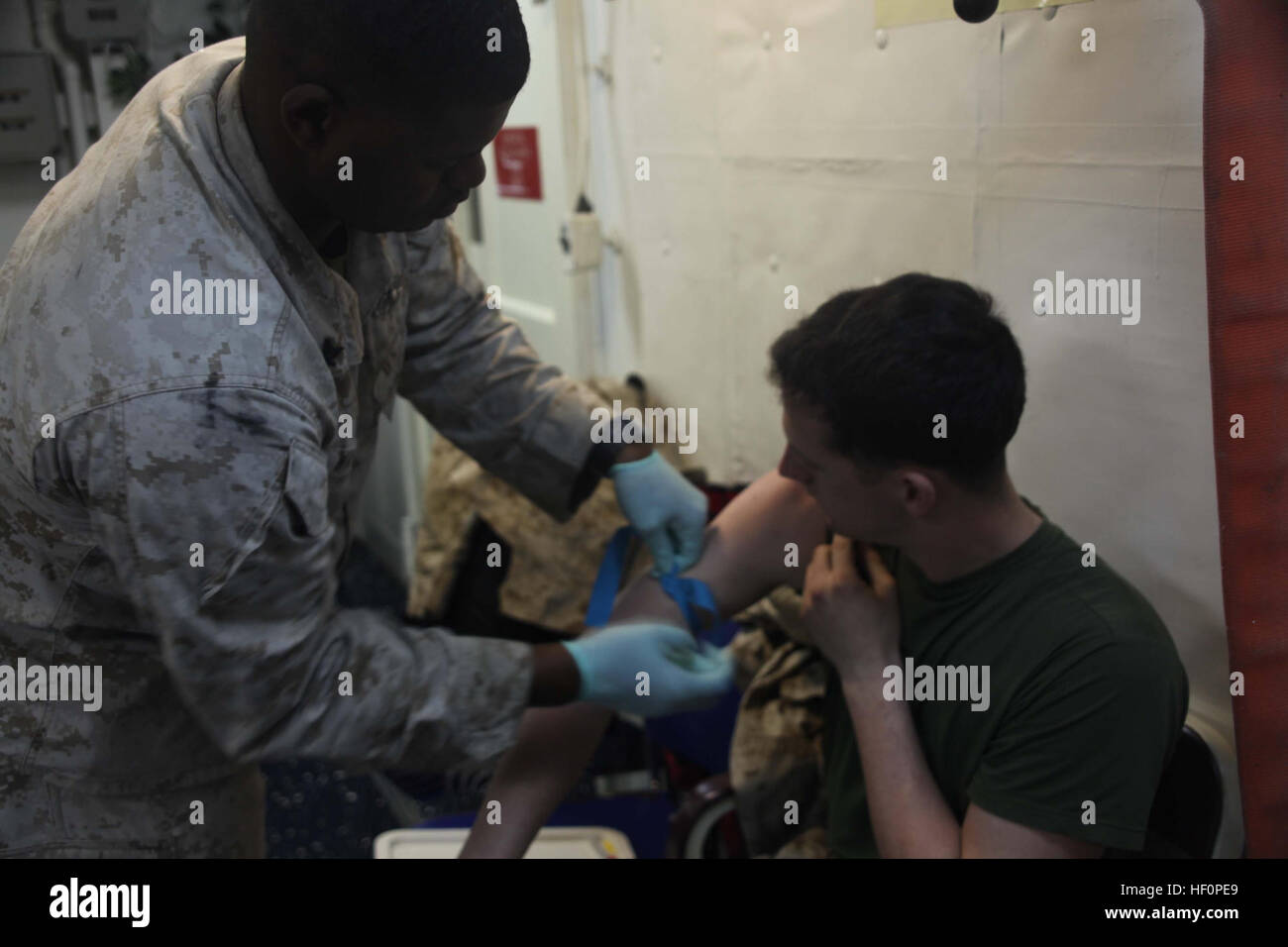 Petty Officer 3rd Class Jason Waters, a corpsman with Weapons Company ...
