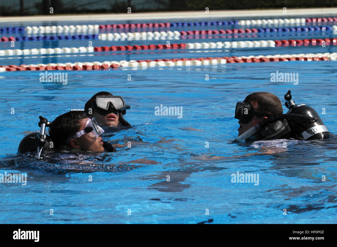 Marines tread water wearing full scuba diving gear during pre-dive ...