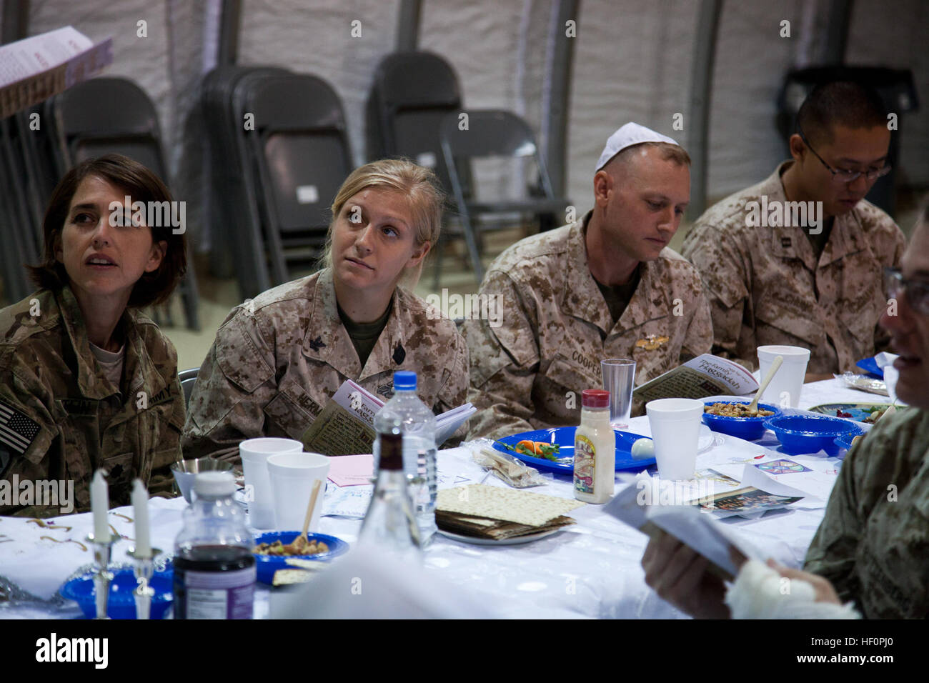 U.S. service members listen to U.S. Navy Capt. Irving Elson, a Jewish ...