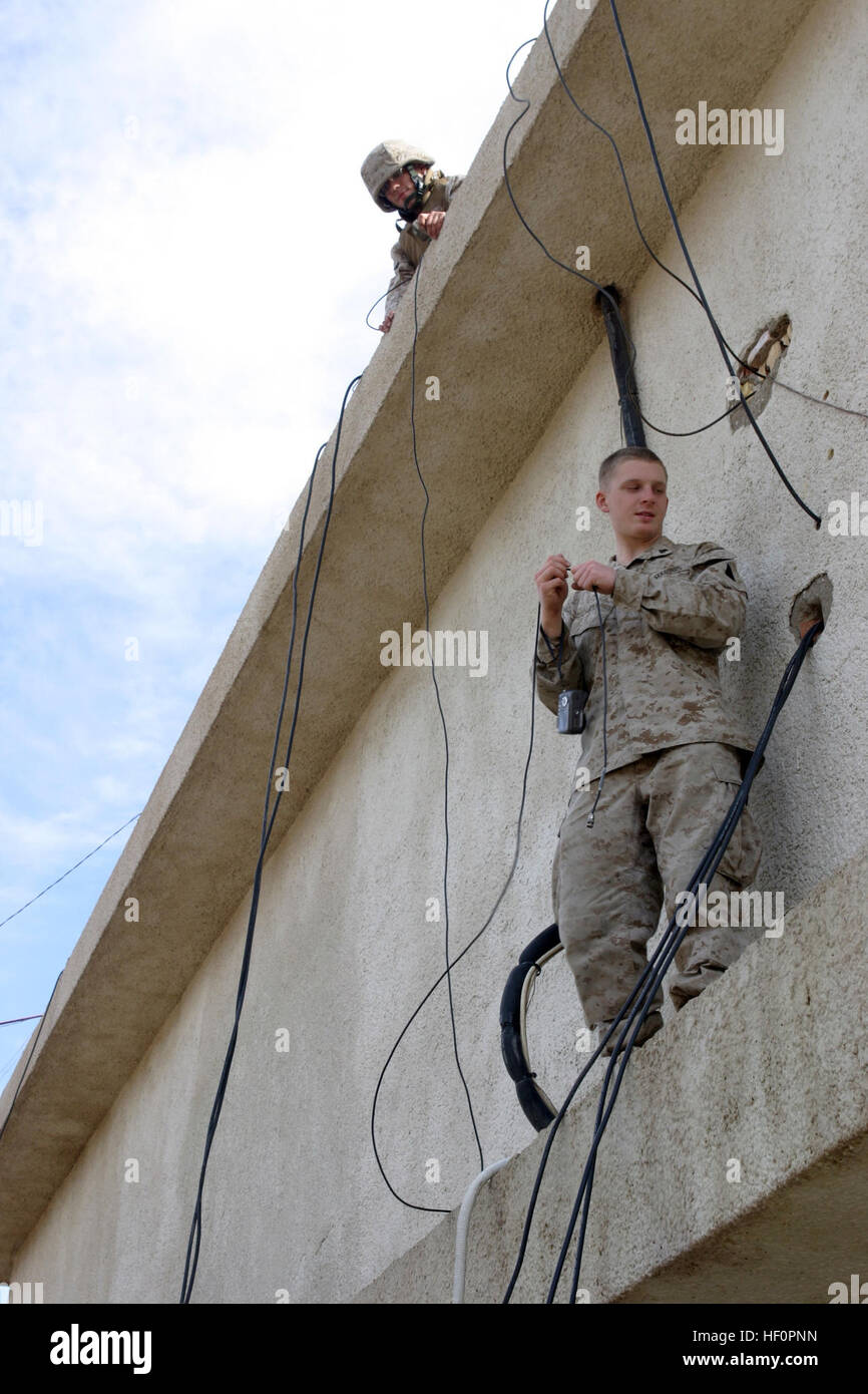 BAGHDAD, Iraq (Mar. 12, 2005) -- Corporals Travis S. Logue, 21, a field ...