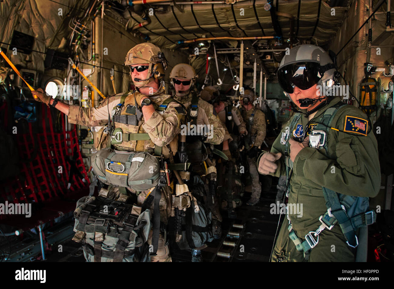 Master Sgt. Heidi Gould (right), a loadmaster with the 211th Rescue ...
