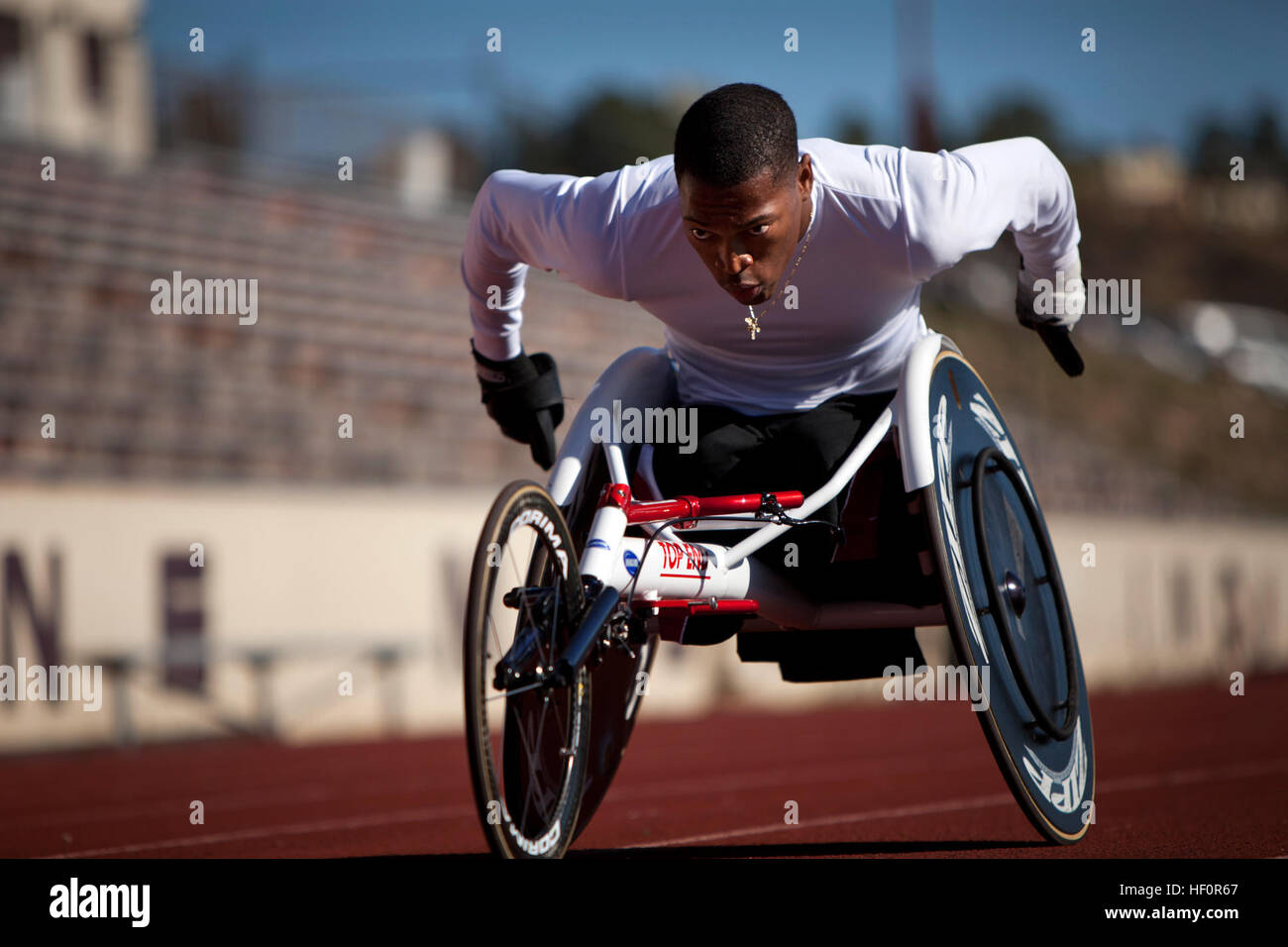 Cpl. Anthony McDaniel races around the track during practice for the ...