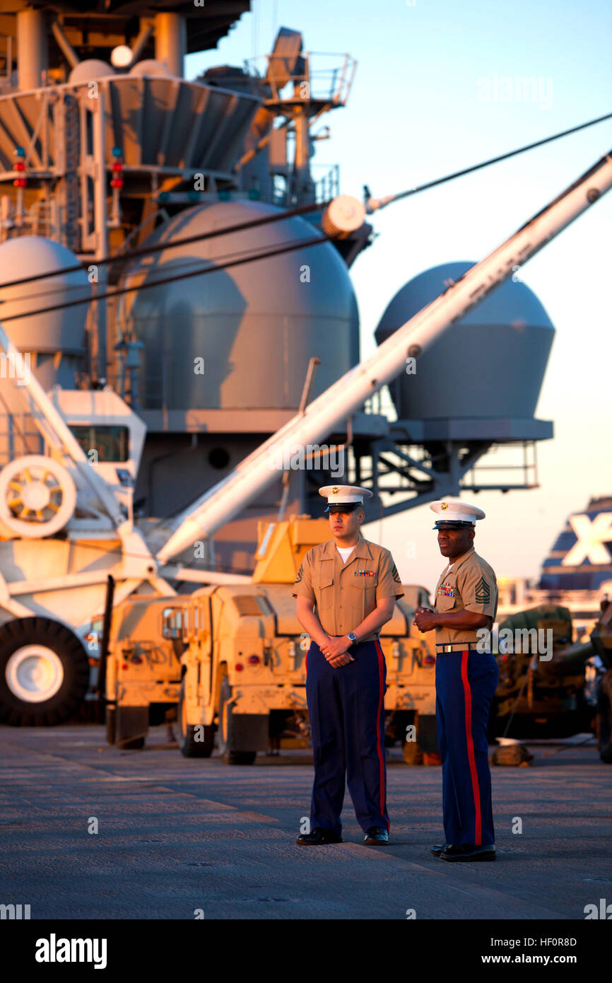 U.S. Marine Corps Staff Sgt. Edward Guevara, left, 26th Marine ...
