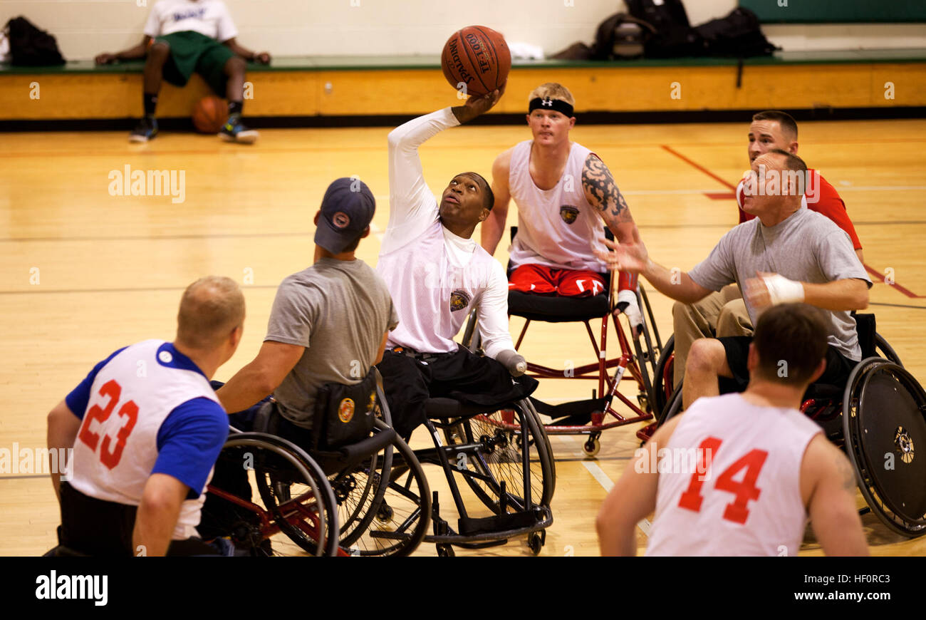 Cpl. Anthony McDaniel, native of Pascagoula, Miss., prepares to put up ...