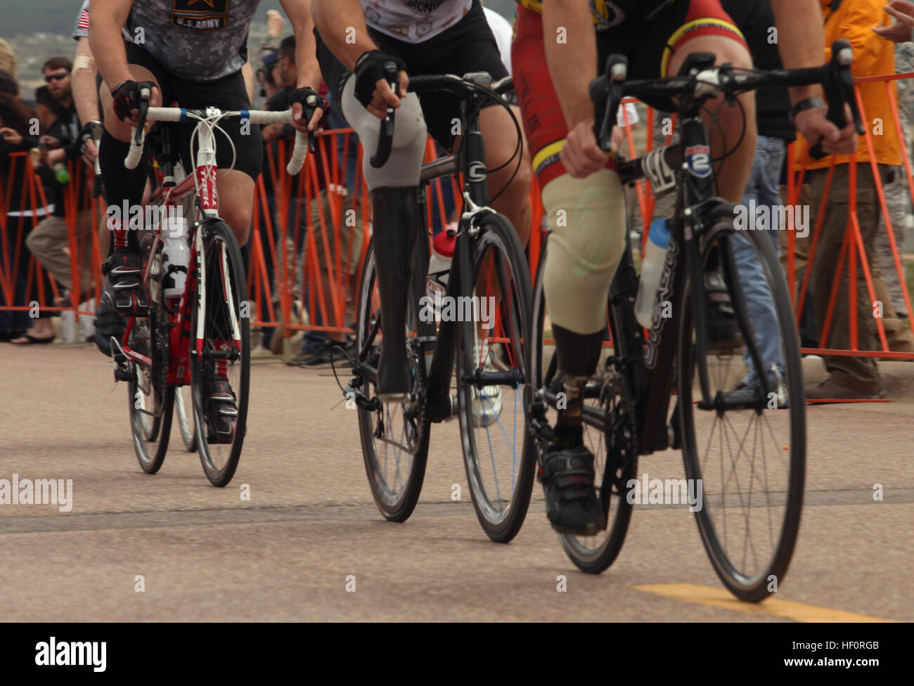 Men competing in the bicycle physical disability race cycle their way ...