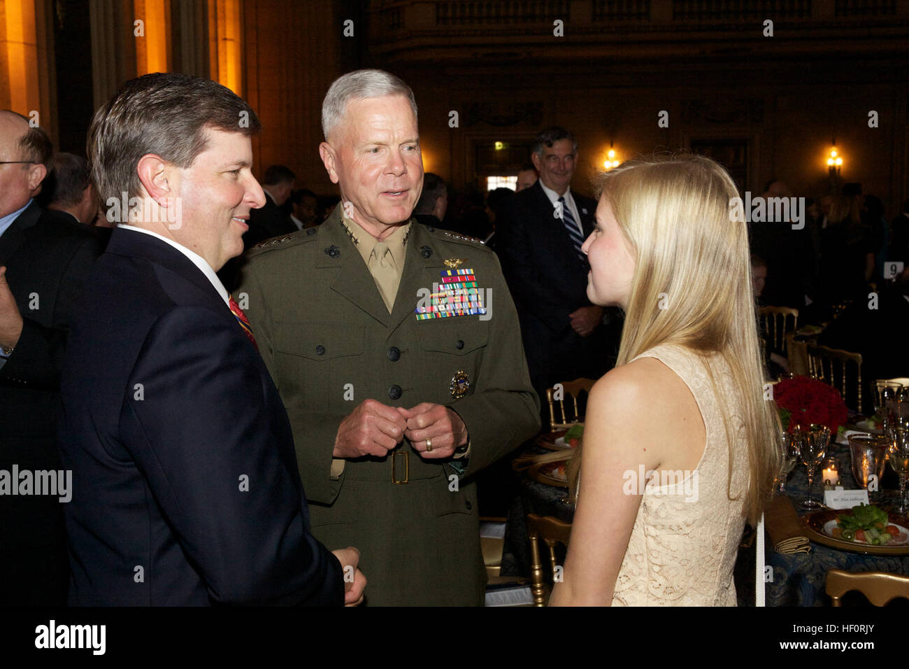 The Commandant of the Marine Corps, Gen. James F. Amos, center, speaks ...