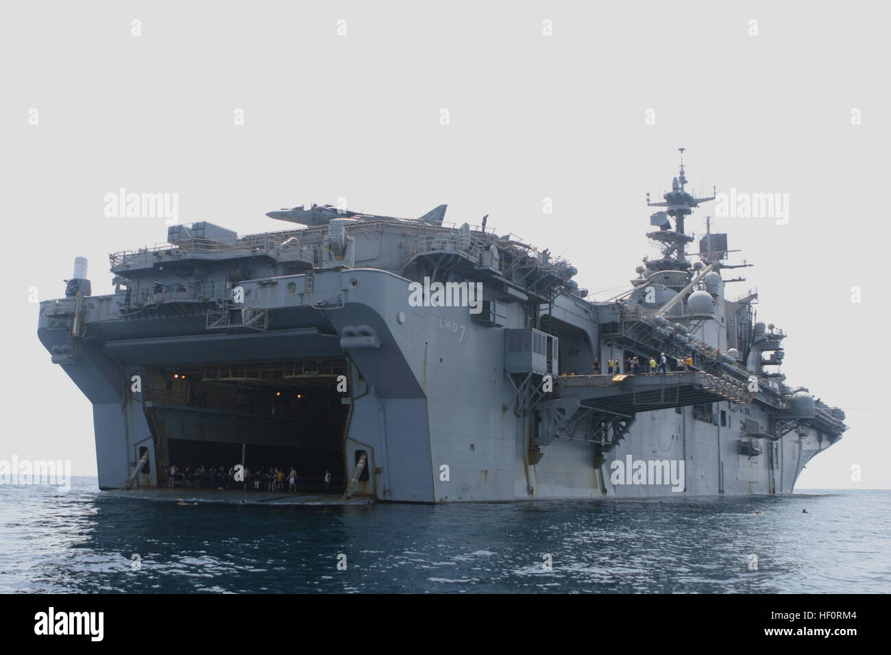 Marines and sailors aboard the USS Iwo Jima (LHD 7) participate in a ...