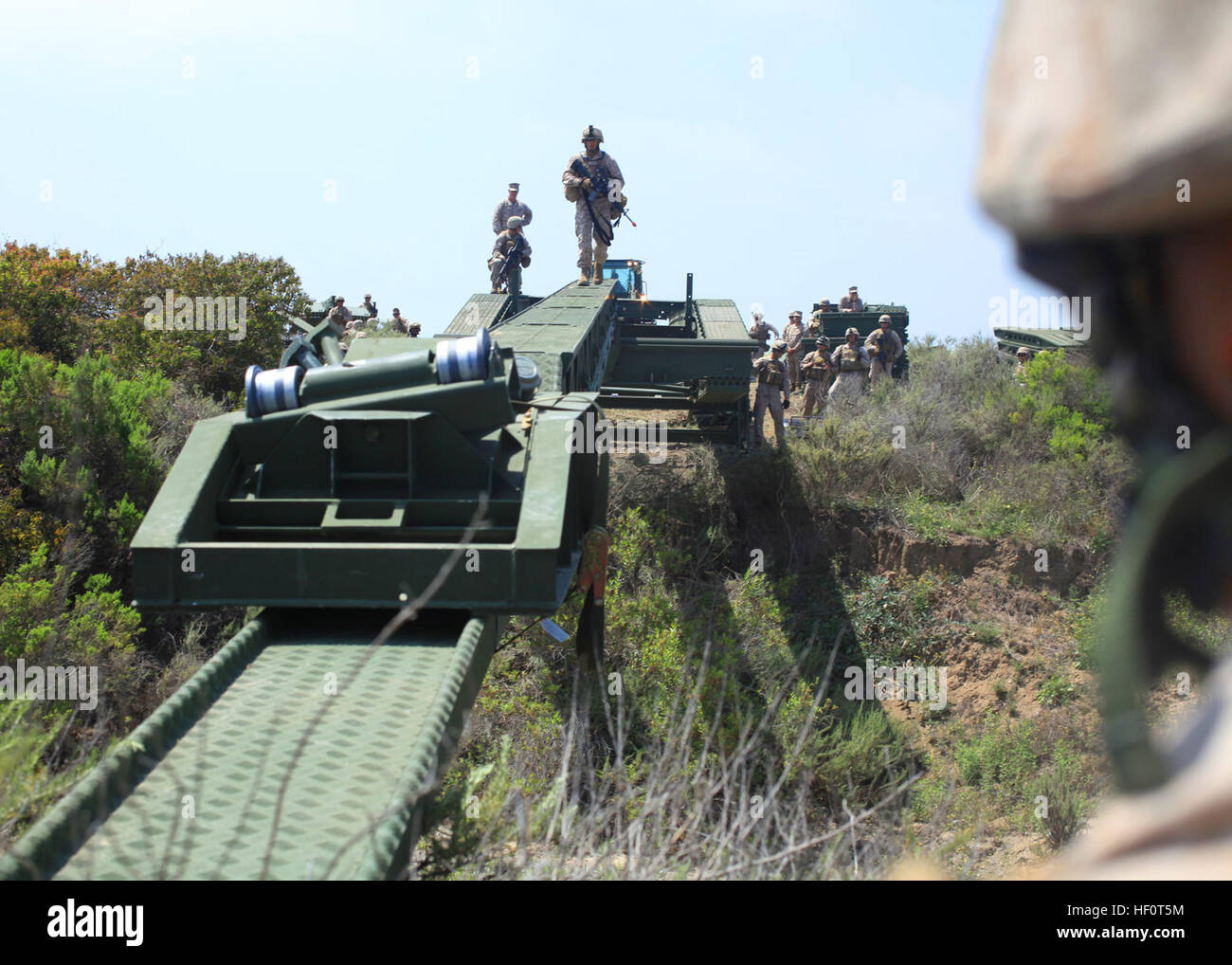 A combat engineer with 7th Engineer Support Battalion, crosses the ...