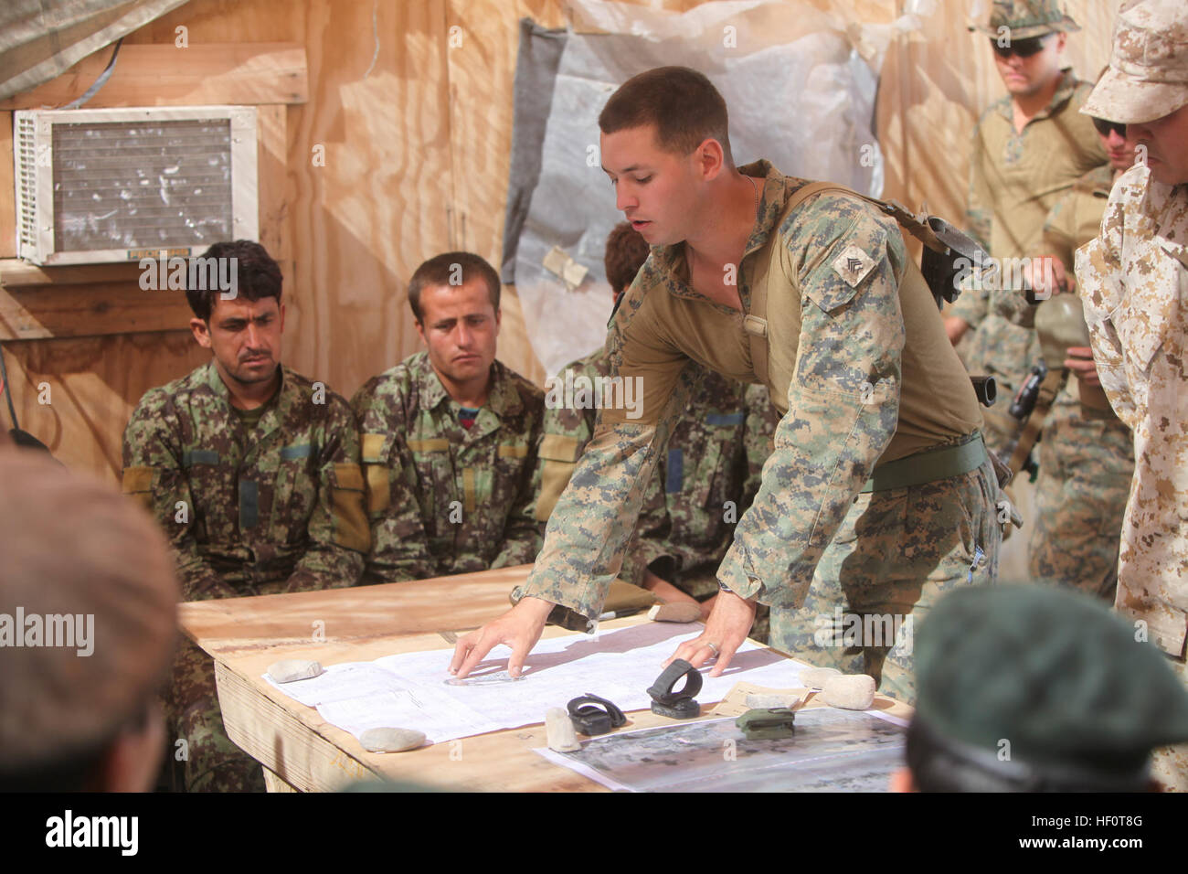 U.S. Marine Corps Sgt. Daniel Doyle, center, with Advisor Team 1, 2nd ...