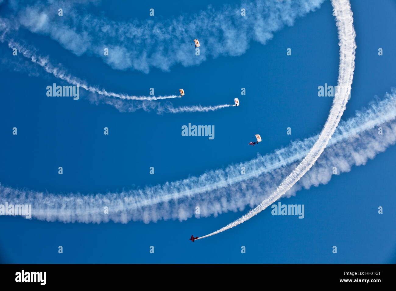 Sean D. Tucker pilots the Team Oracle Challenger II bi-plane, bottom ...