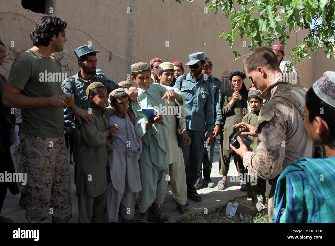U.S. Marine Corps 2nd Lt. Logan Giger, second from right, with Police ...