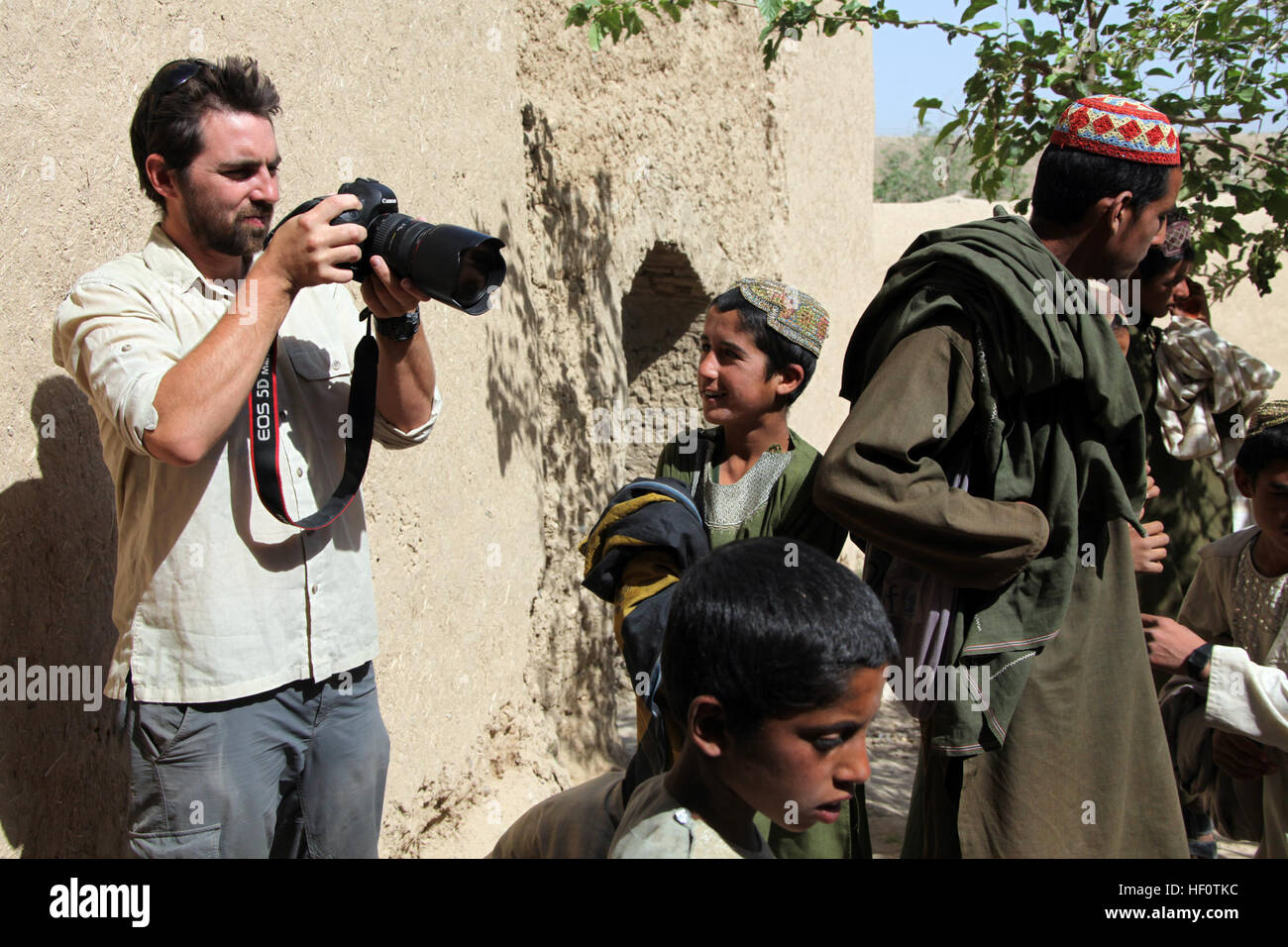Ben Foley, left, cameraman, with Al Jazeera English News Channel ...