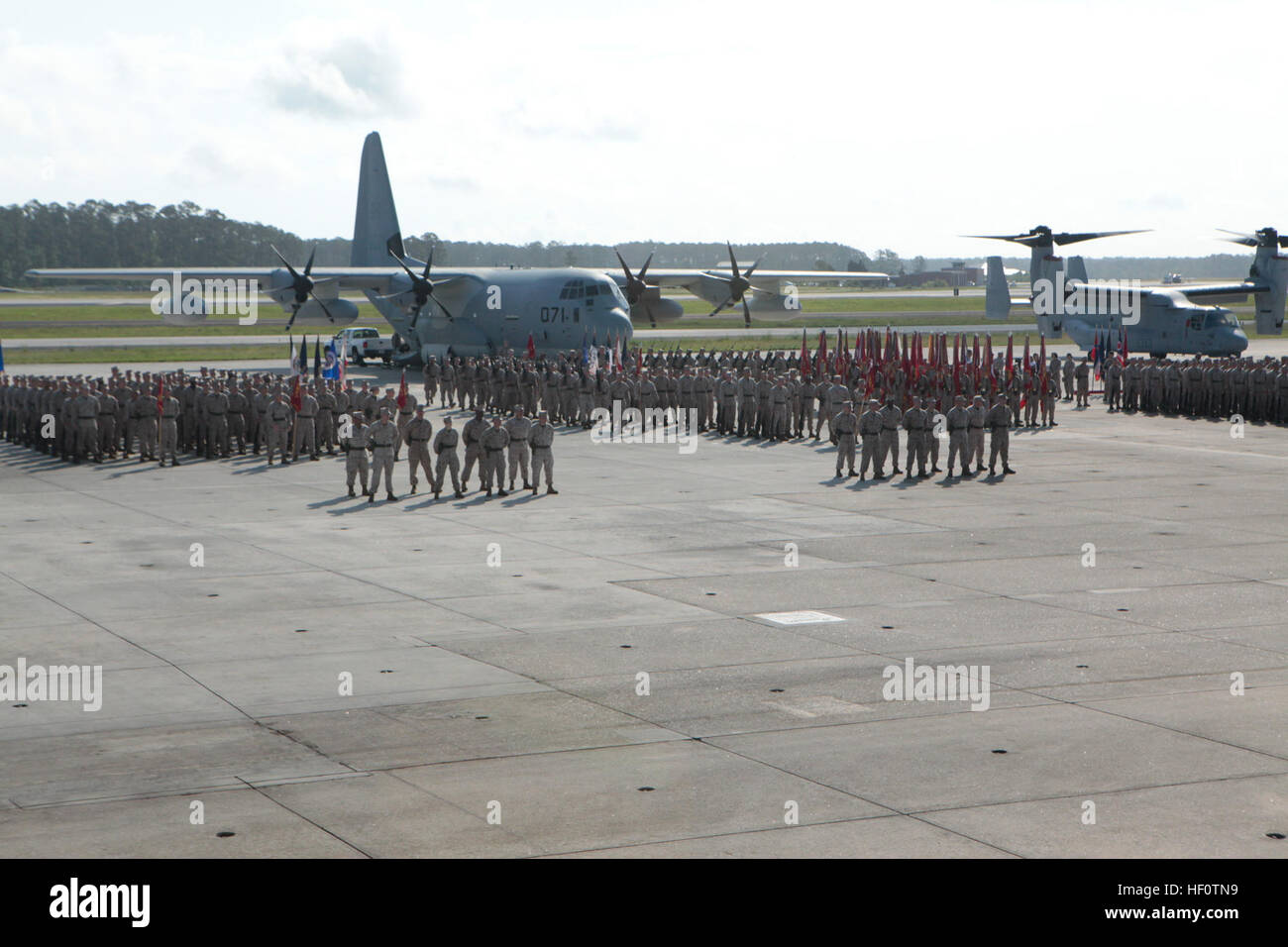 Elements of 2nd Marine Aircraft Wing stand in formation prior to a ...
