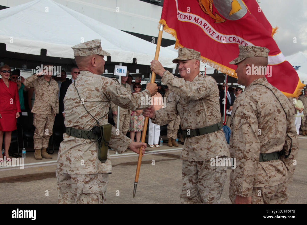 Maj. Gen. Jon M. Davis hands the 2nd Marine Aircraft Wing combat colors ...