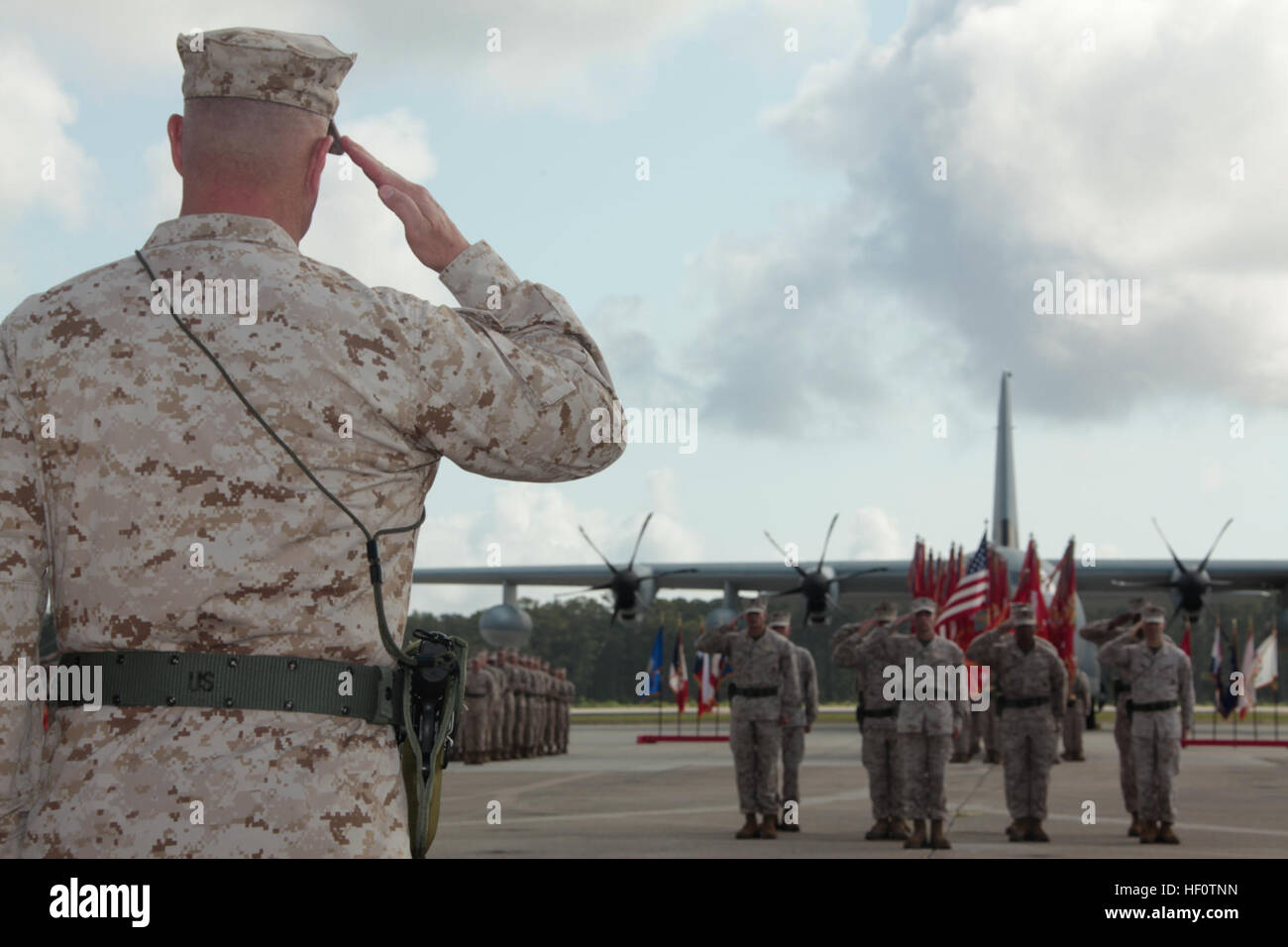 A formation of 2nd Marine Aircraft Wing Marines salute Maj. Gen. Glenn ...