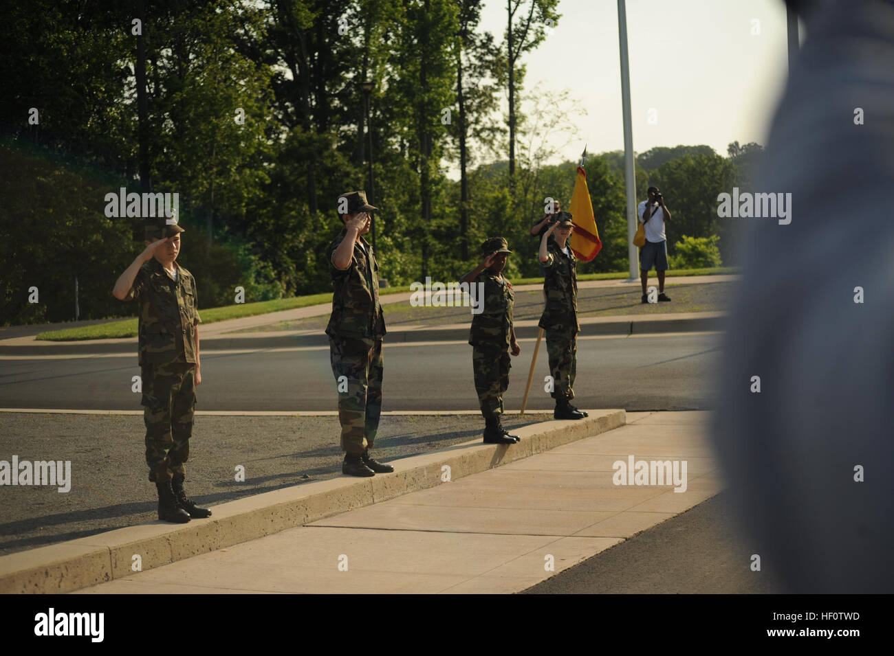 The Young Marines salute the Band of Brothers and guest as they leave the National Museum of the ...