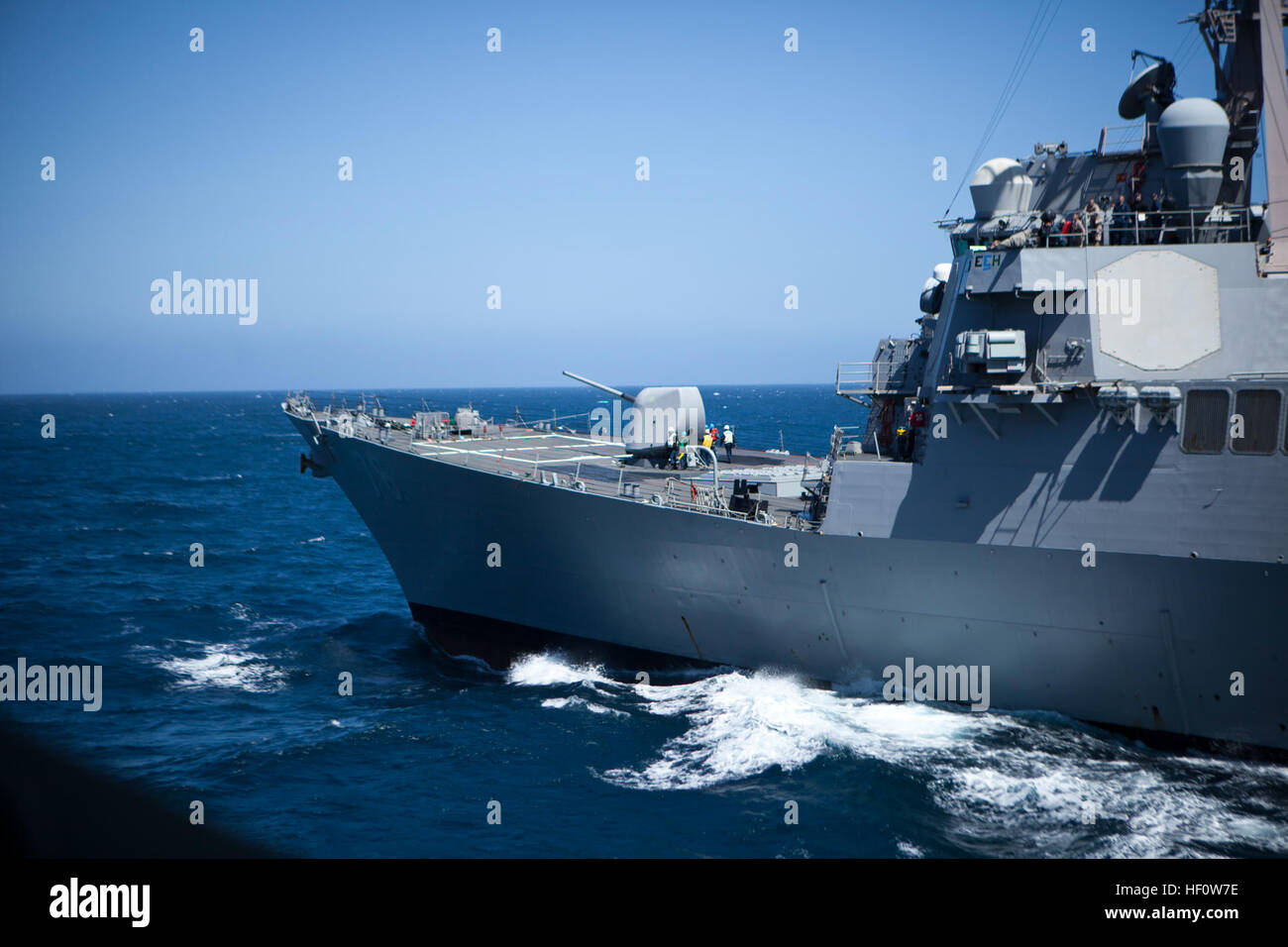 USS Harris and USS Peleliu conduct a ship-to-ship refueling exercise to ...