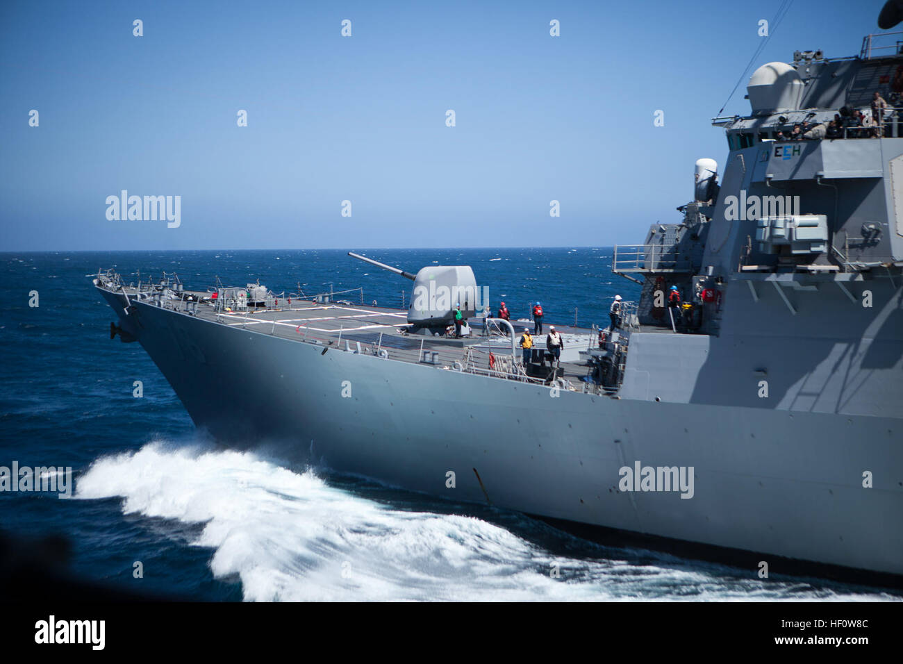 USS Harris and USS Peleliu conduct a ship-to-ship refueling exercise to ...