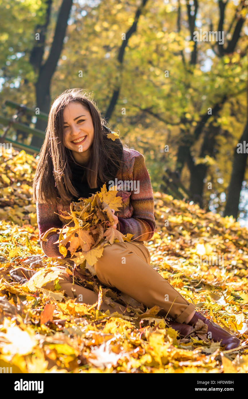 beautiful girl in autumn Park Stock Photo - Alamy