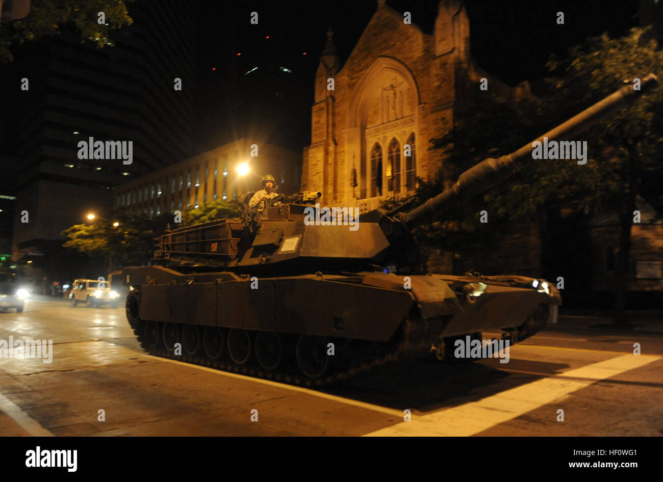 U.S. Marines with 4th Tank Battalion drive an M1-A1 Abrams tank along ...