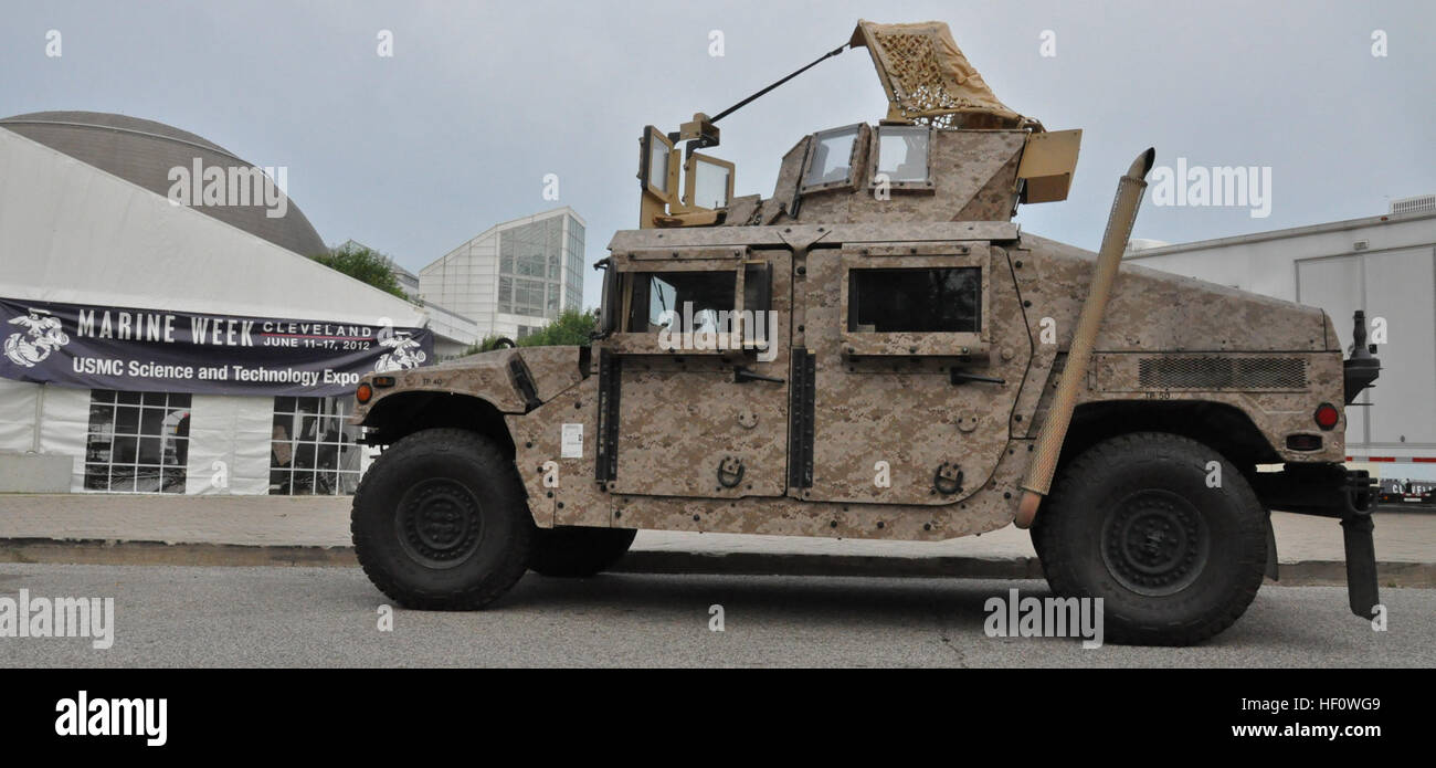 Painted in desert digital print, a up-armored M1114 Humvee is staged in ...