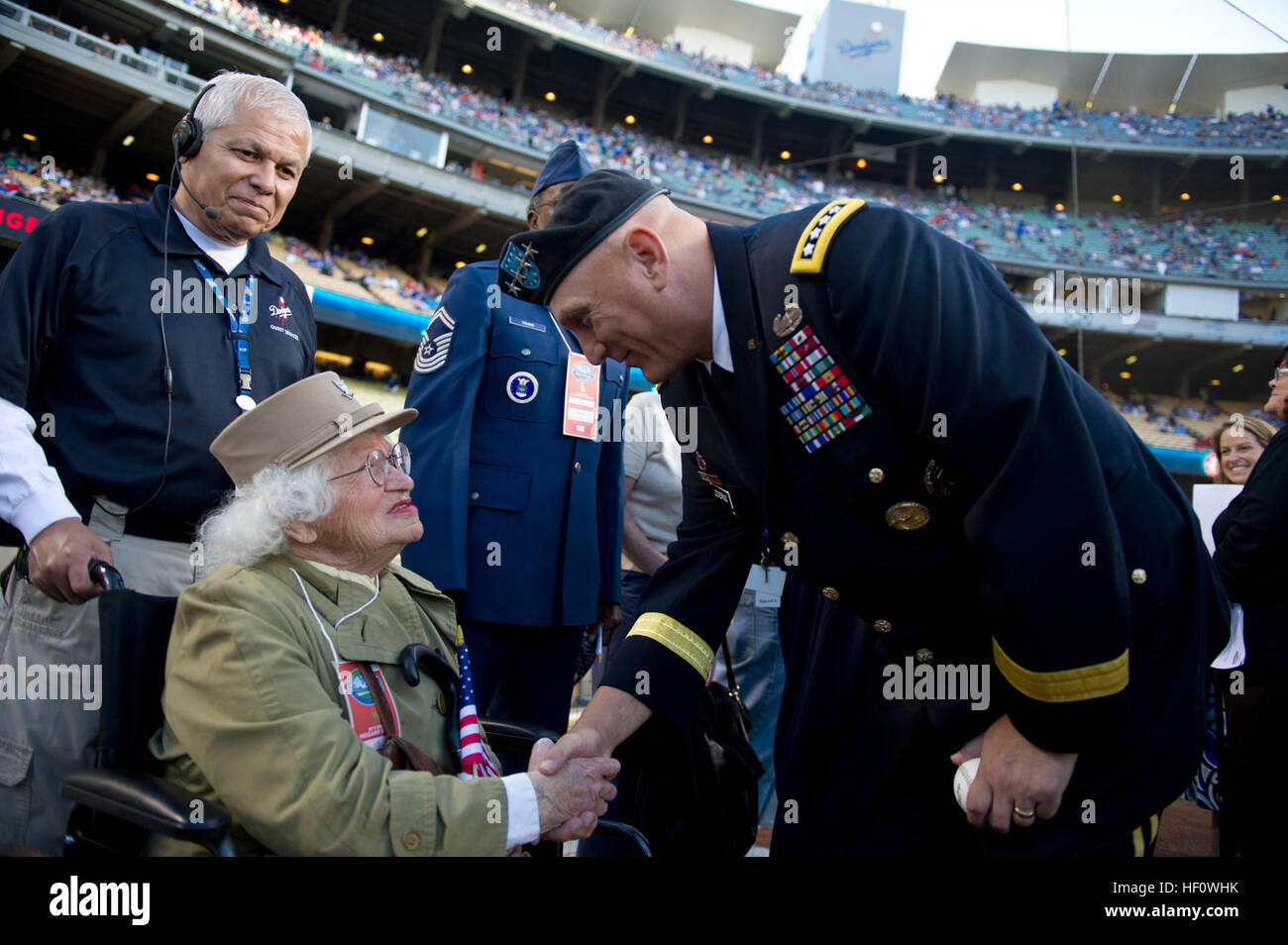U.S. Army Chief of Staff Gen. Raymond T. Odierno shakes hands with Col ...