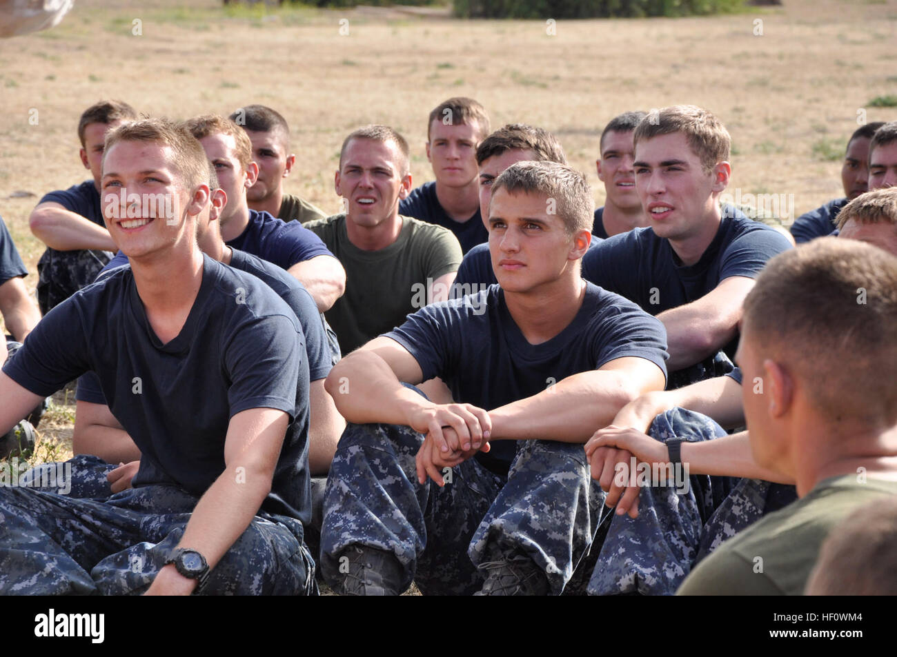 Naval Reserve Officer Training Corp’s (NROTC) Midshipmen, listen to the ...