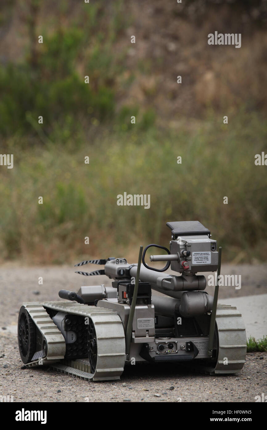 A robot is used for reconnaissance to find and clear improvised ...