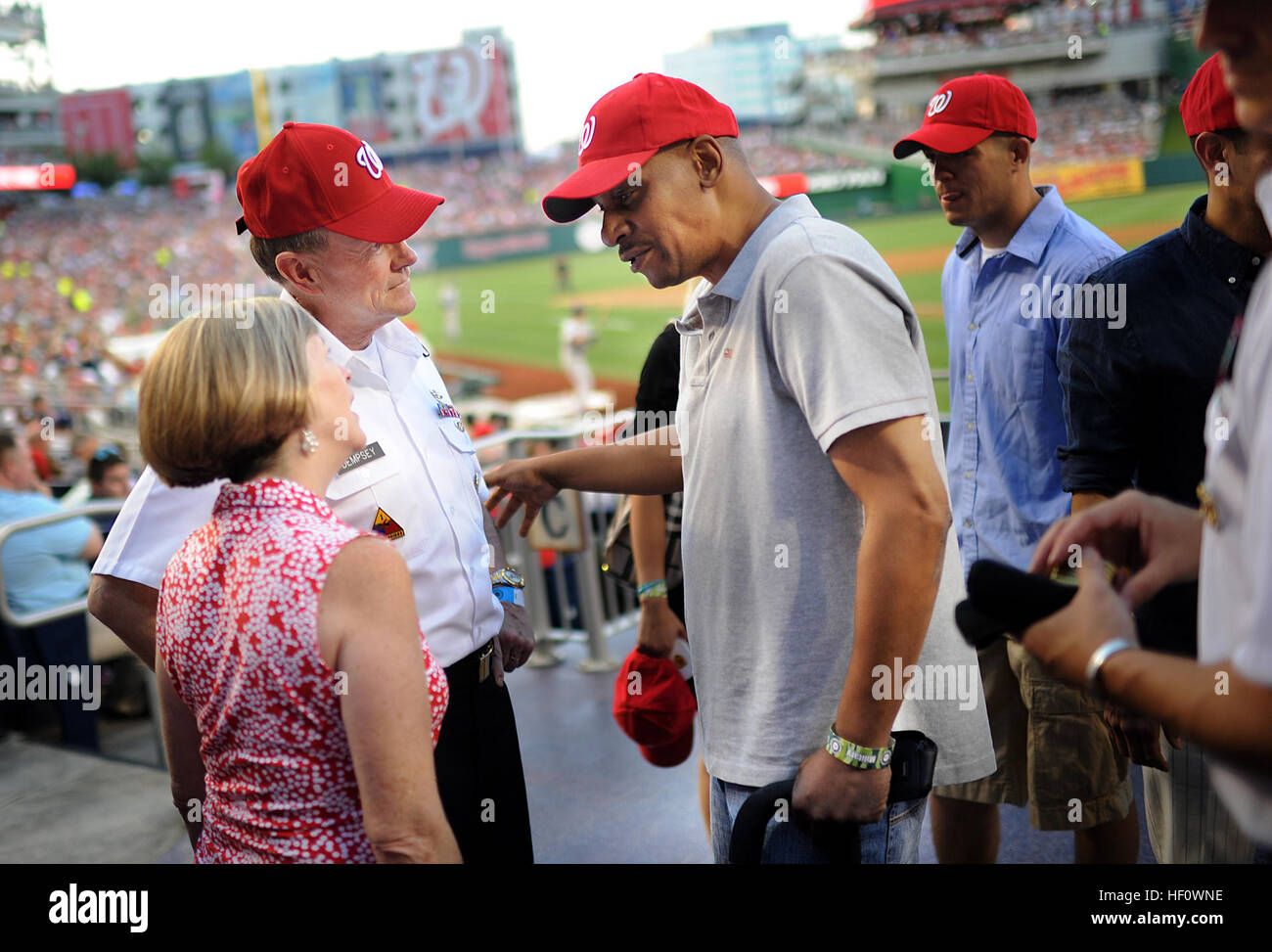 Senior military leaders engage with a Wounded Warrior during a baseball ...
