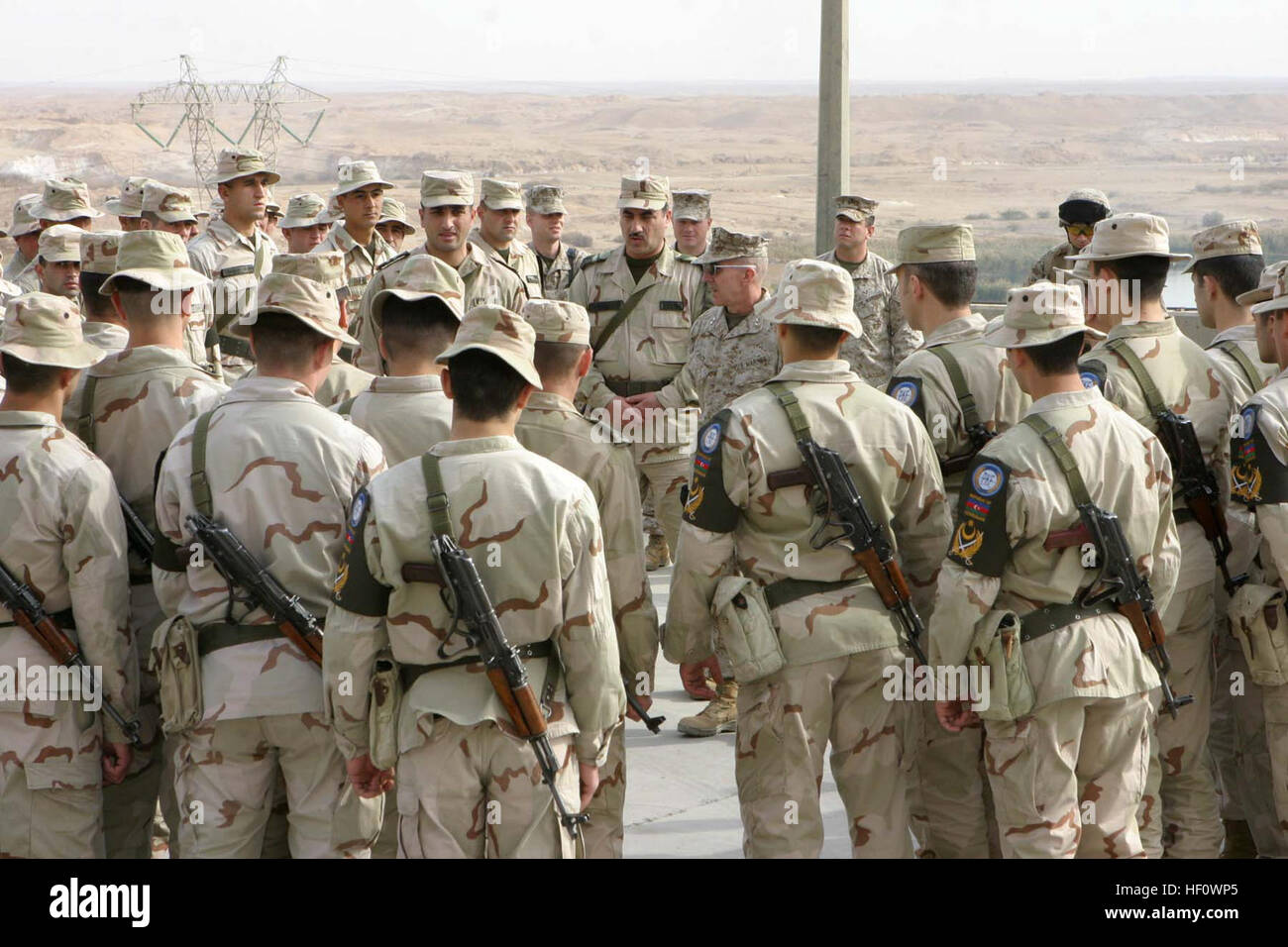 HADITHA DAM, Iraq (Jan. 2, 2006) - Azerbaijani soldiers circle around ...