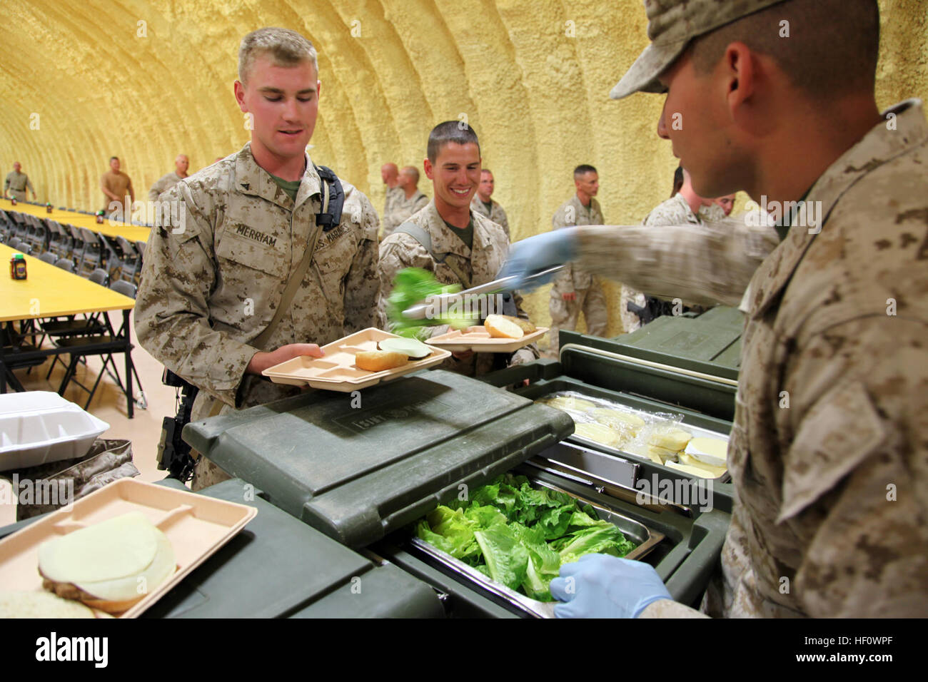 U.S. Marine Corps Lance Cpl. Cristian J. Barajas, right, a data systems ...