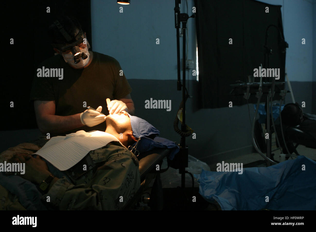 CAMP TAQADDUM, Iraq (May 23, 2005) - Commander William Davidson, doctor ...