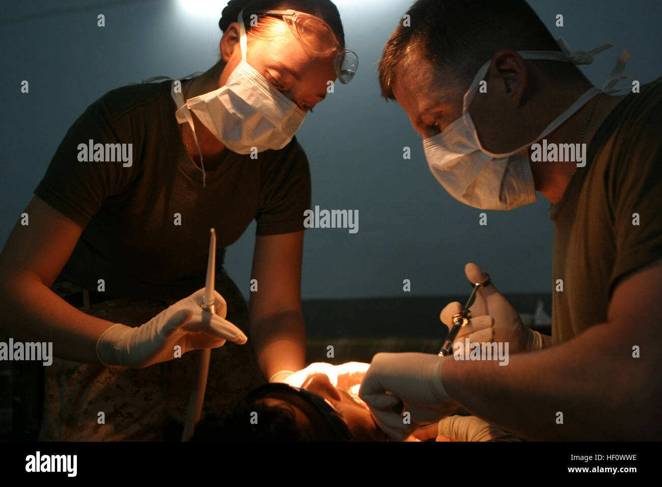 CAMP TAQADDUM, Iraq (May 23, 2005) - Commander William Davidson, doctor ...