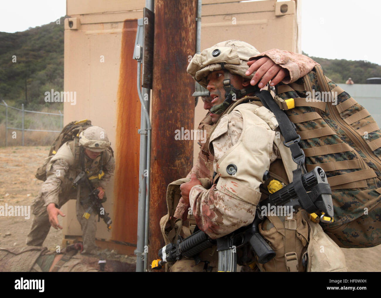 A corpsman with Field Medical Training Battalion West helps a role ...