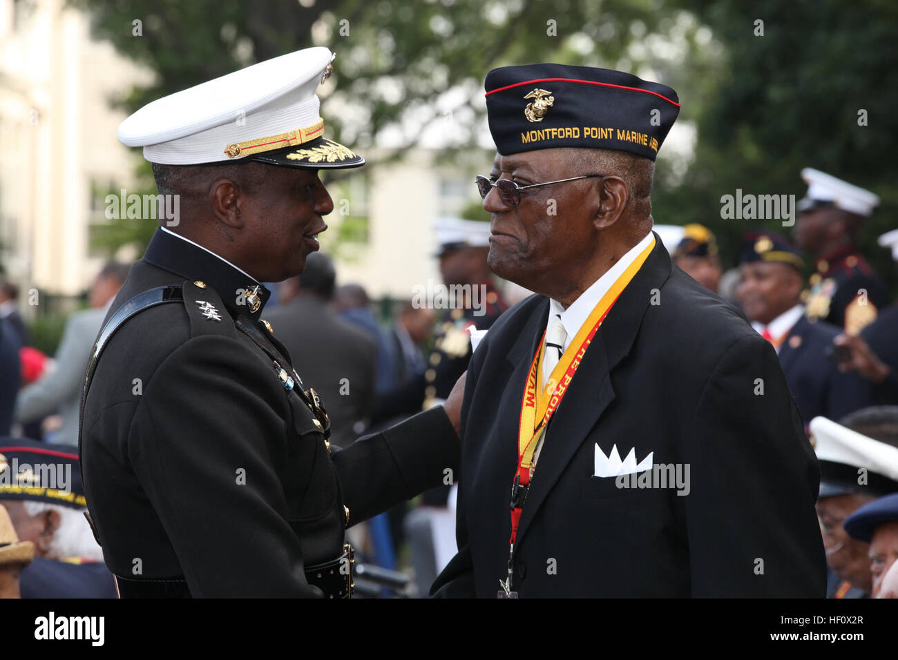 U.S. Marine Corps Lt. Gen. Walter E. Gaskin, left, visits with an ...