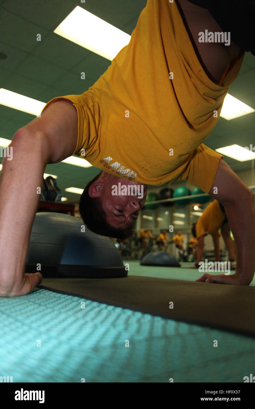 Petty Officer 2nd Class Corey A. Baker, a diver with aquatic survival ...