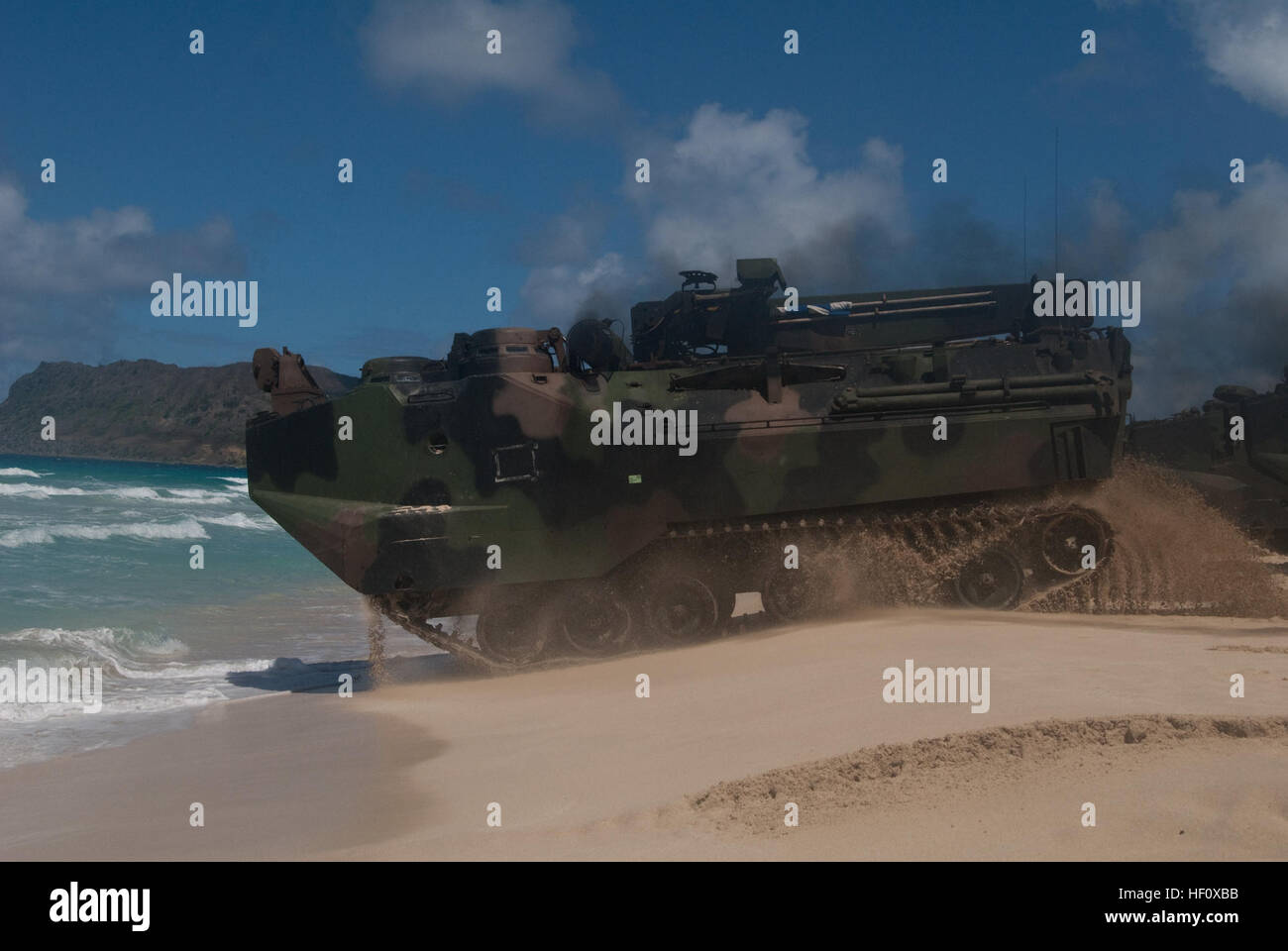 Marines from Combat Assault Company, 3rd Marine Regiment, launch an ...