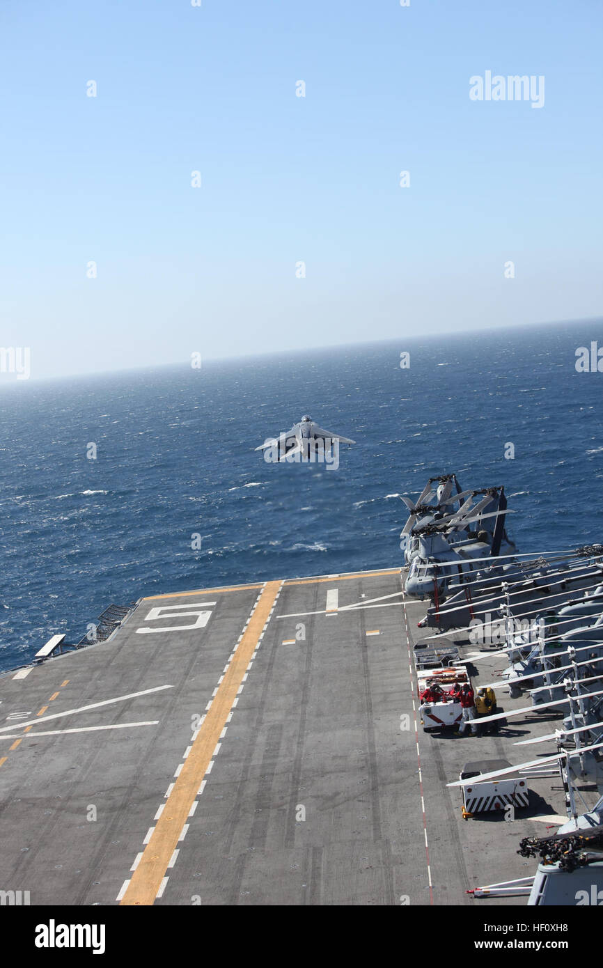 U.S. Marine Corps AV-8B Harrier takes off from the flight deck of the ...