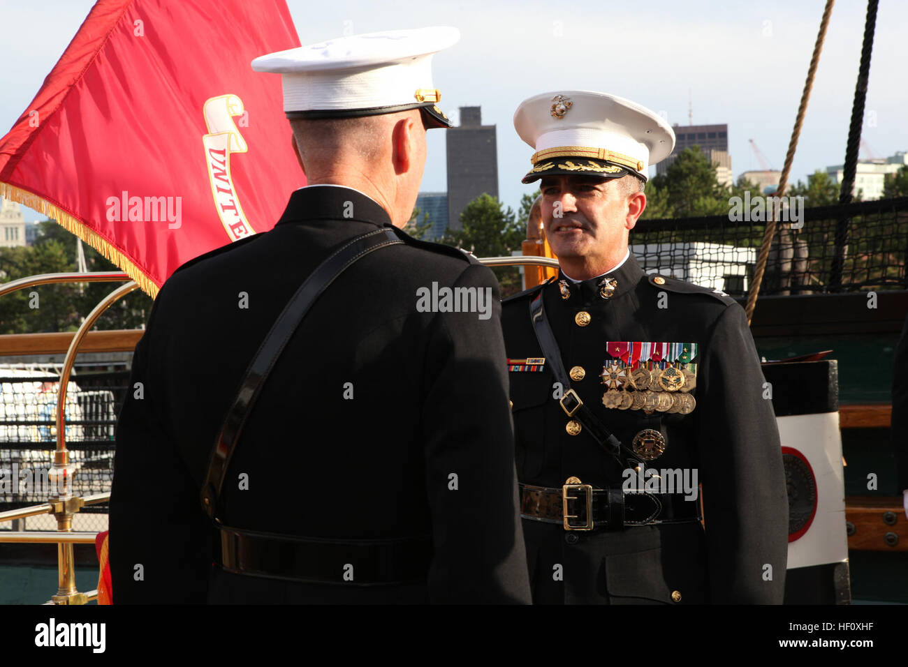 U.S. Marine Col. Paul J. O'Leary, right, salutes Assistant Commandant ...