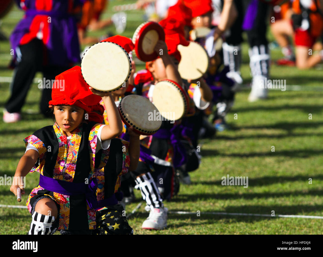 A young eisa dancer pauses during a performance at the 35th Annual ...