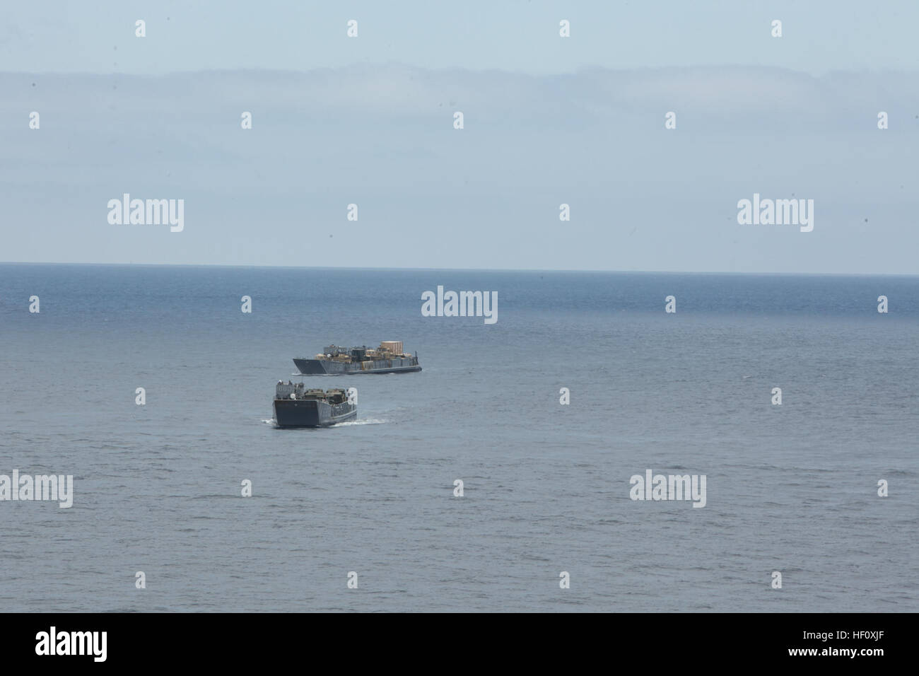 Two U.S. Navy Landing Craft Utility (LCU), attached to the 15th Marine Expeditionary Unit float ...
