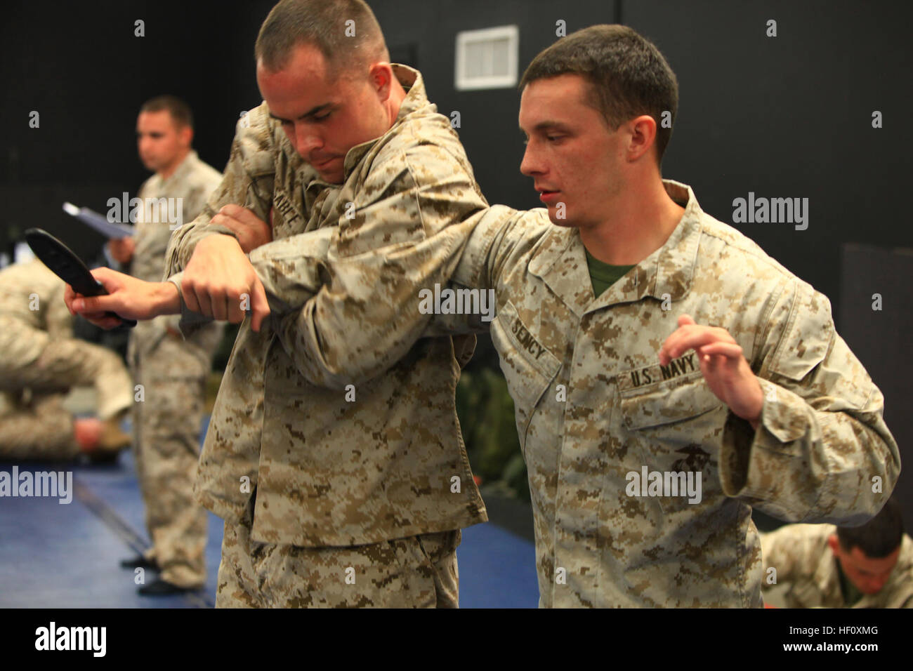 Petty Officer 3rd Class Michael J. Sency (right), a religious program ...