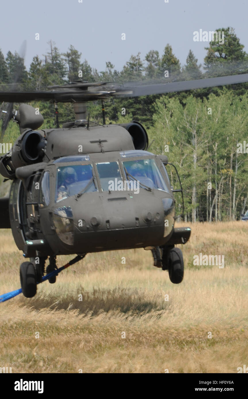 Colo using uh 60 helicopter equipped with hoist nets hi-res stock ...