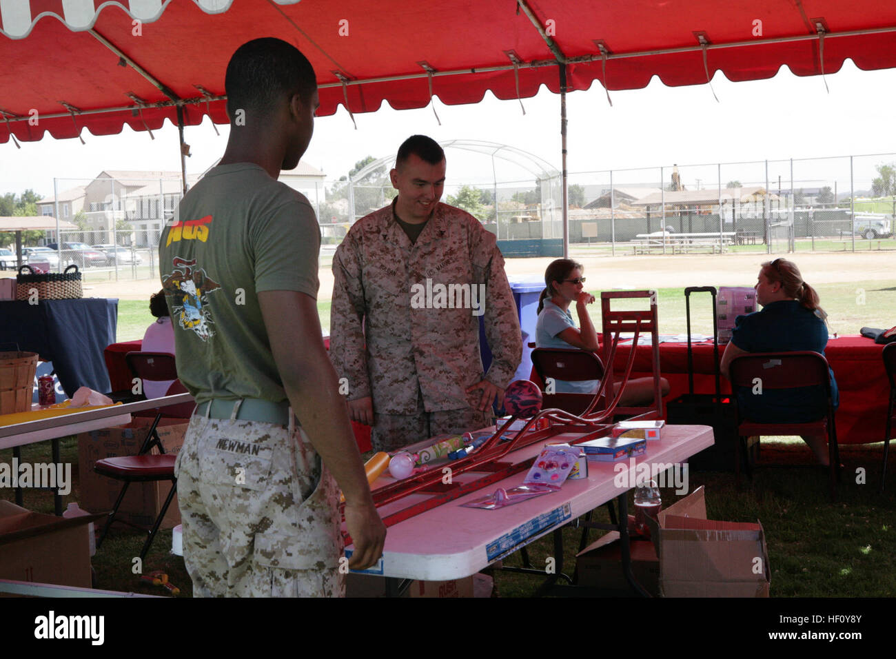 Pfc. Miles Newman, left, an aviation operation specialist with ...