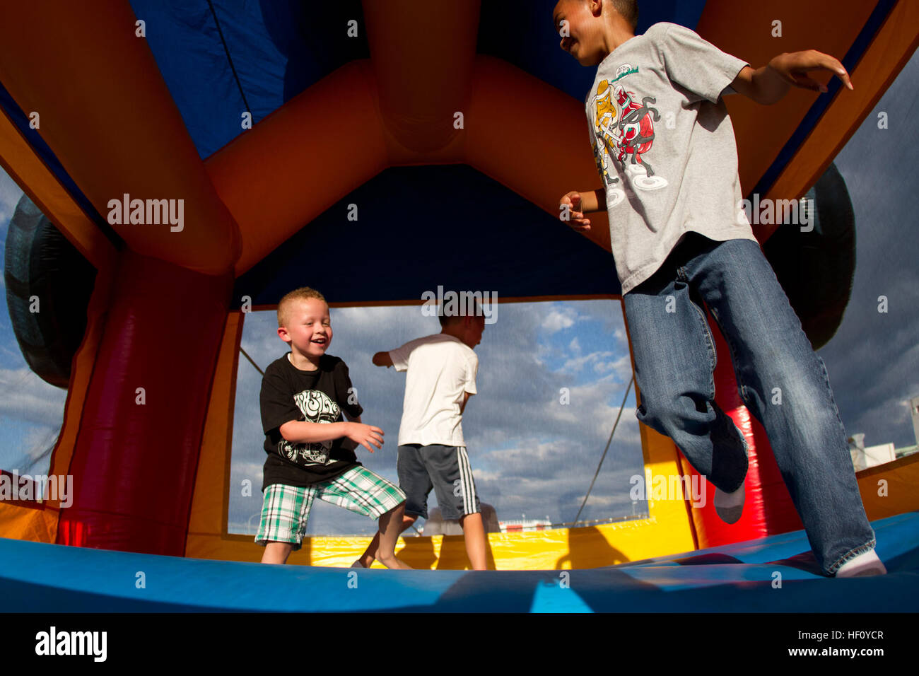 Children of Marines have fun in the bounce house during Summer Music ...